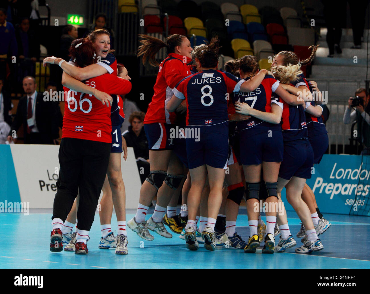 Great Britain's handball team celebrate their victory over Angola ...