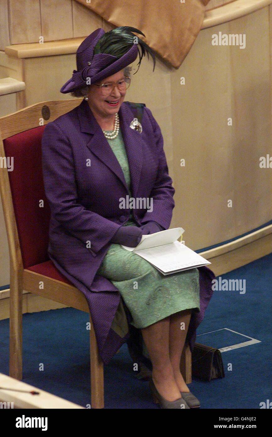 The Queen smiles during the official opening of the Scottish Parliament ...