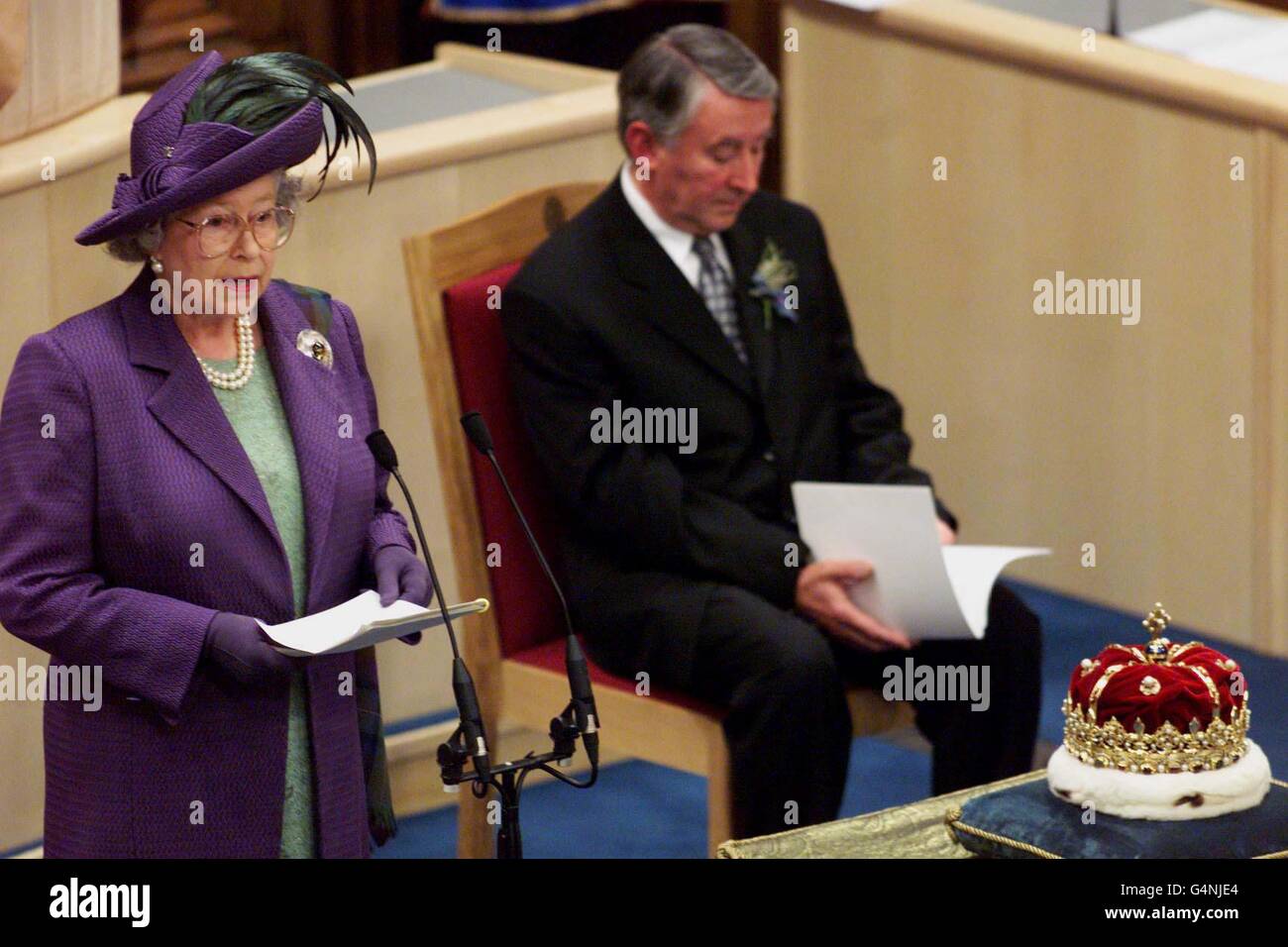 Lord Steel, the Presiding Officer, listens as Britain's Queen Elizabeth ...