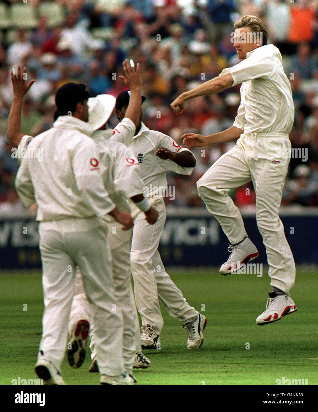 Celebrates the wicket of alan mullally hi-res stock photography and ...