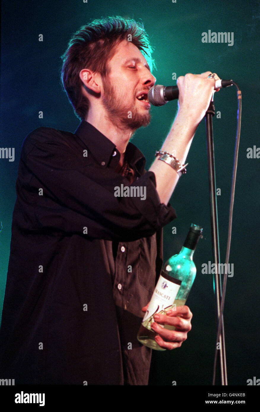 Former Pogues member Shane MacGowan performs on stage with his group ...