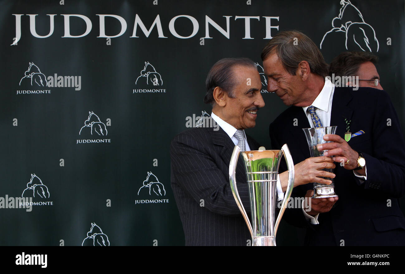 Prince Khalid Abdullah presents a trophy to trainer Sir Henry Cecil ...