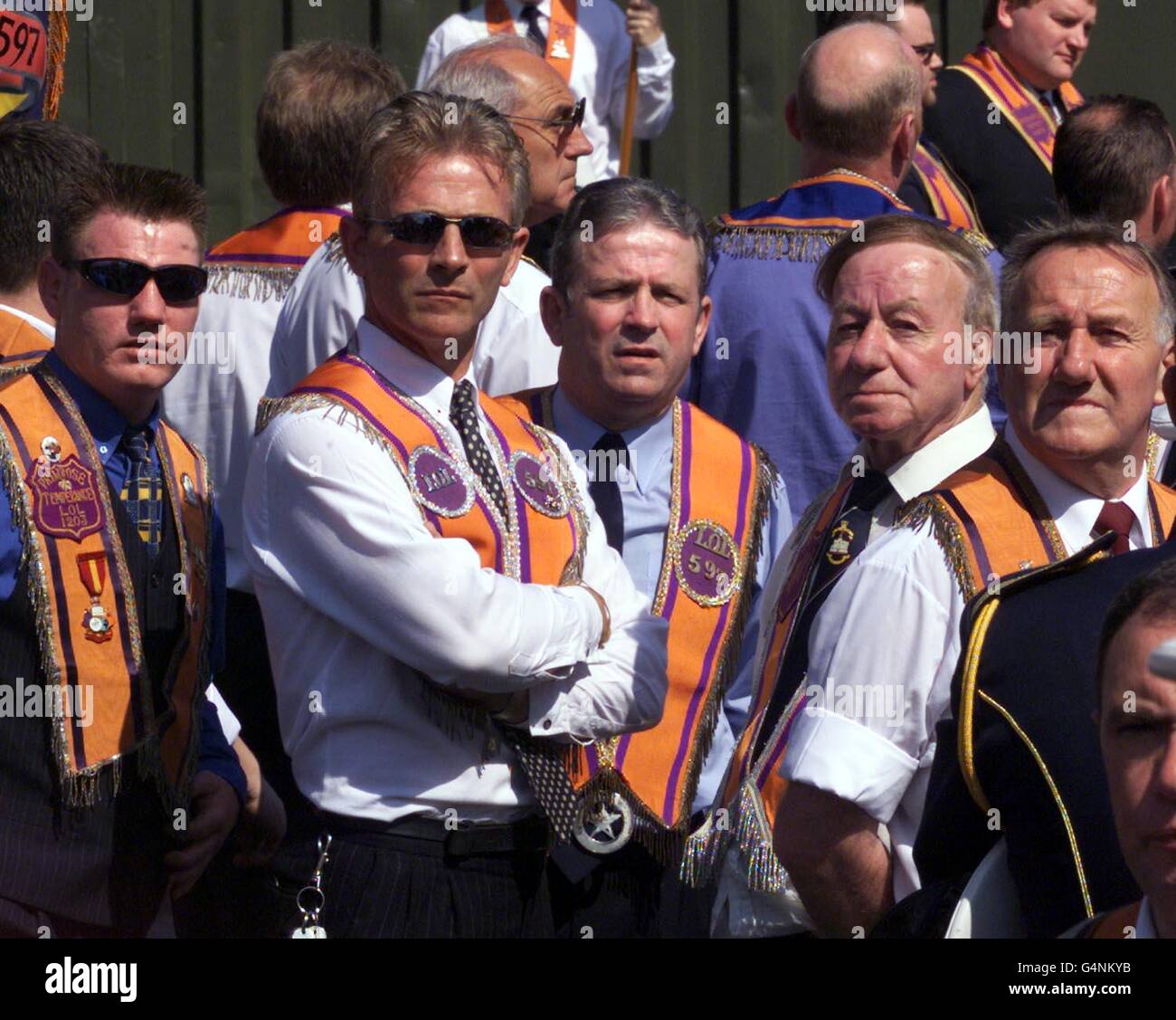 Orangemen gather at Ormeau Bridge in Belfast. Their route has been ...