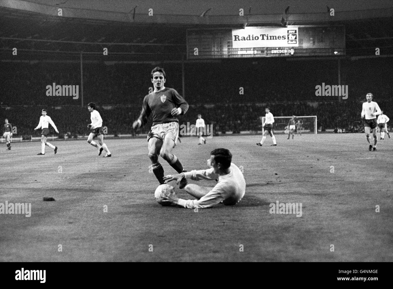 England goalkeeper Alex Stepney, who is making his debut, saves at the ...