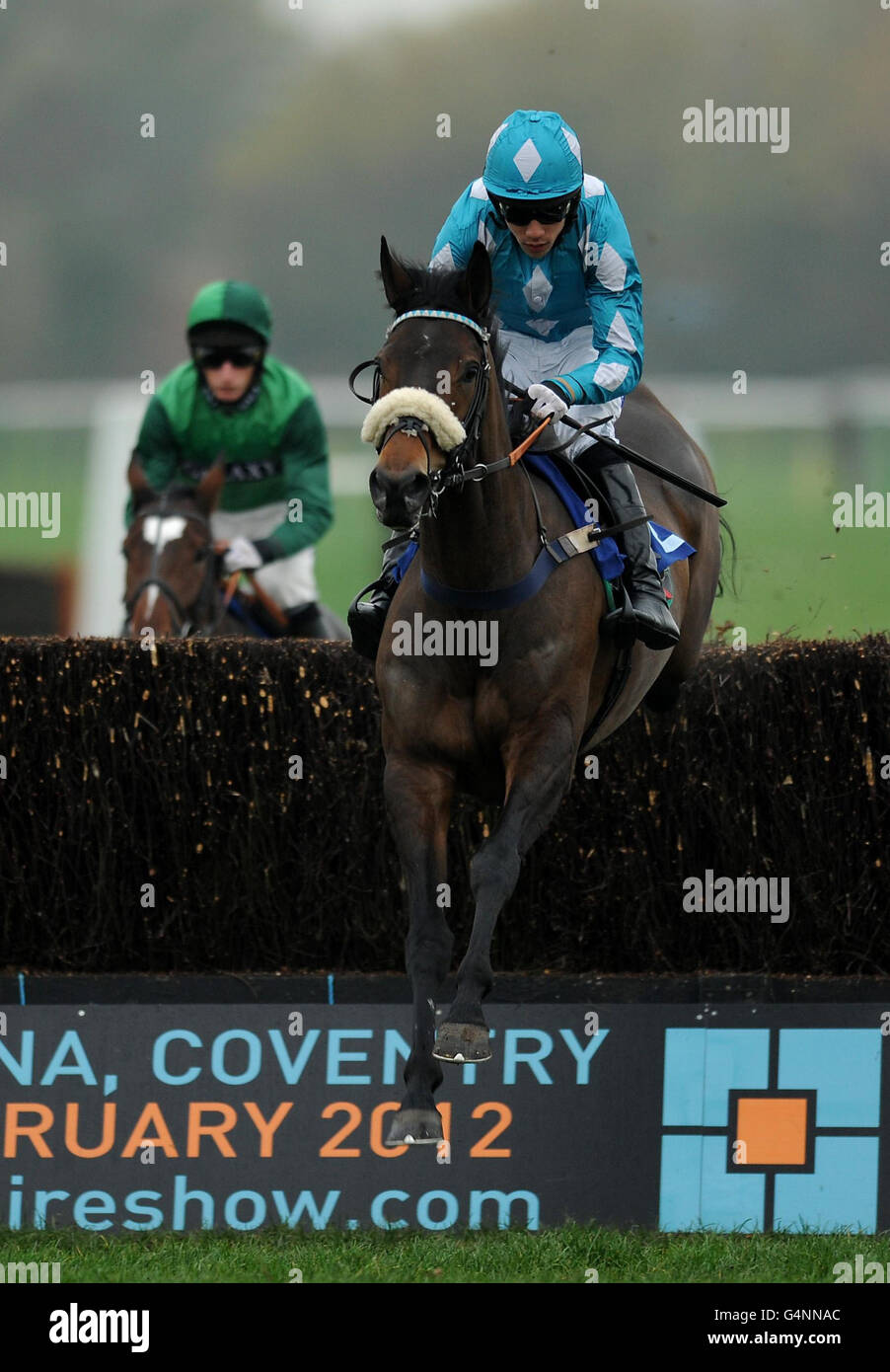 Tatispout ridden by Jockey Felix de Giles jumps the last fence before ...