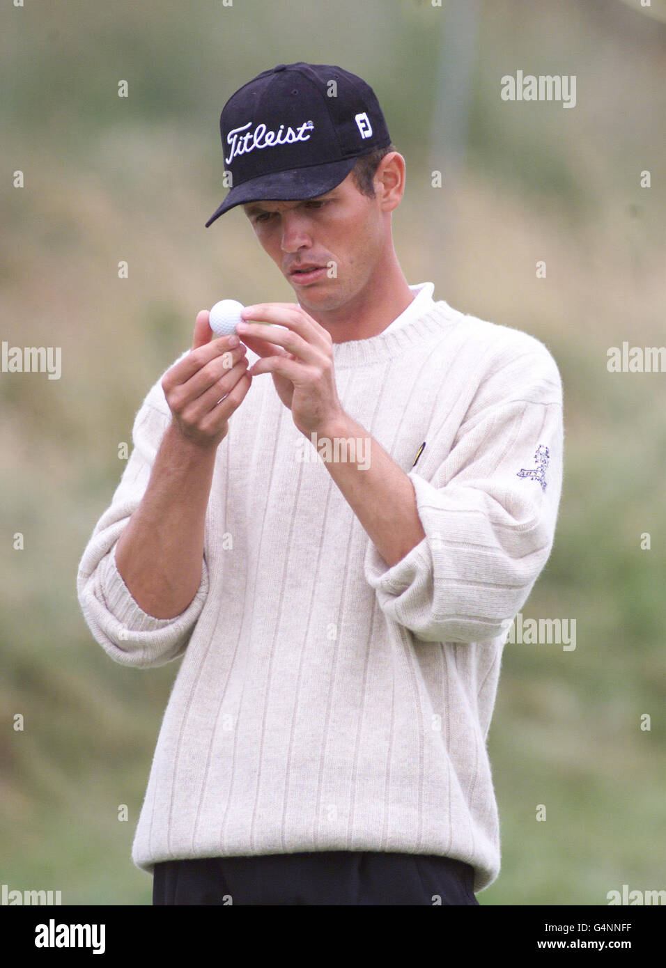 Scotland's Andrew Coltart checks his ball on the 2nd green during the ...