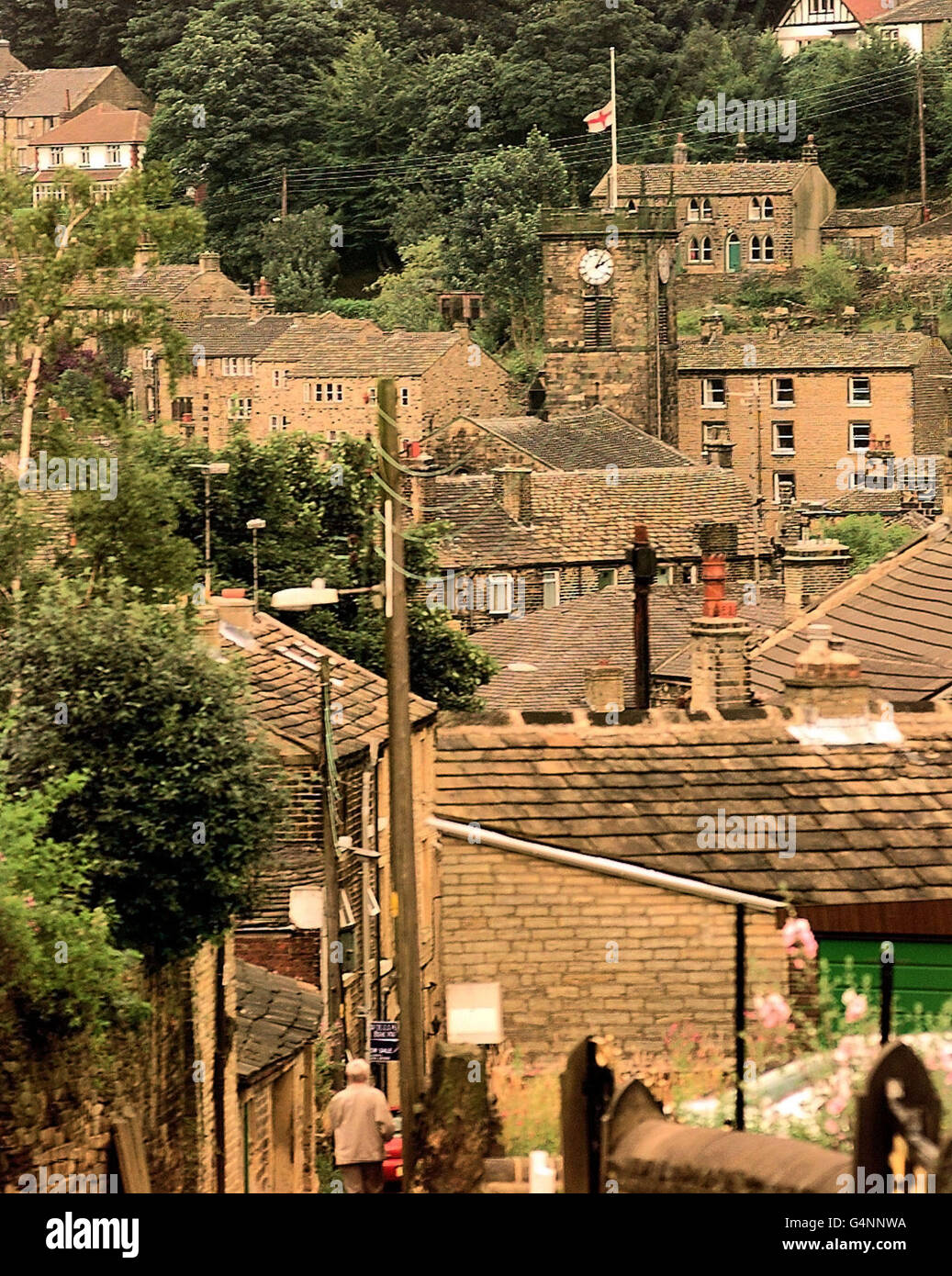 The flag on the church in Holmfirth flies at half mast to mark the ...