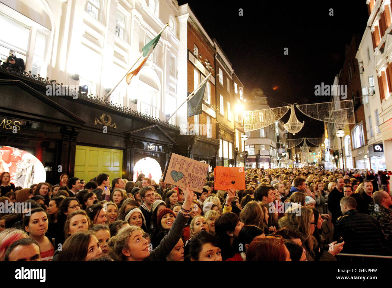 Crowds gather on Grafton Street in Dublin where Canadian artist Michael ...