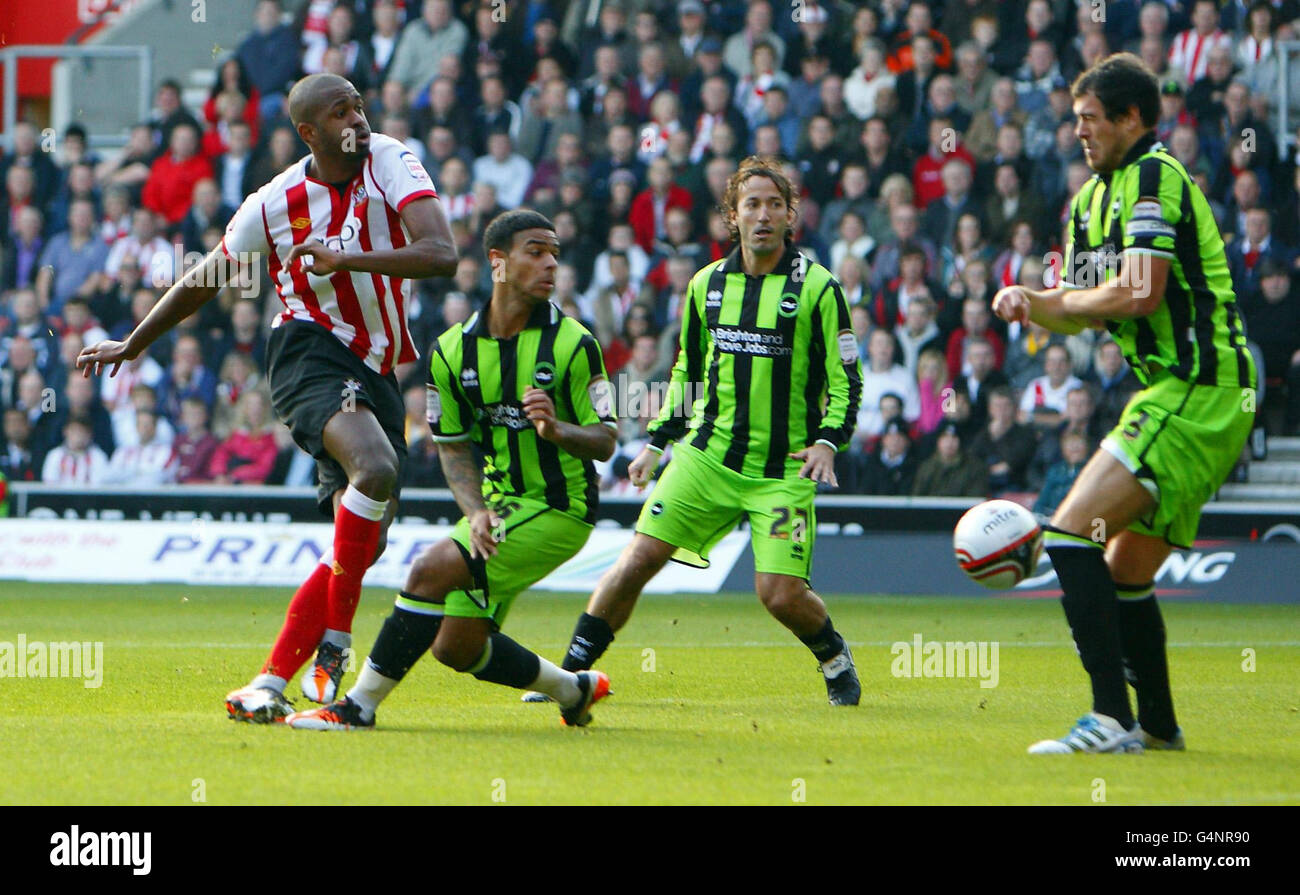 Soccer southampton full length kicking mangrr hi-res stock photography ...
