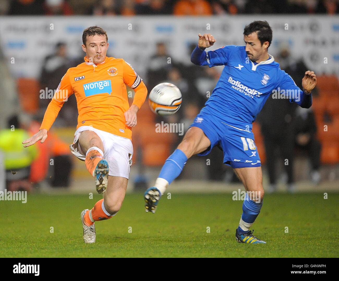 Blackpool's Barry Ferguson (left) and Birmingham City's Keith Fahey ...