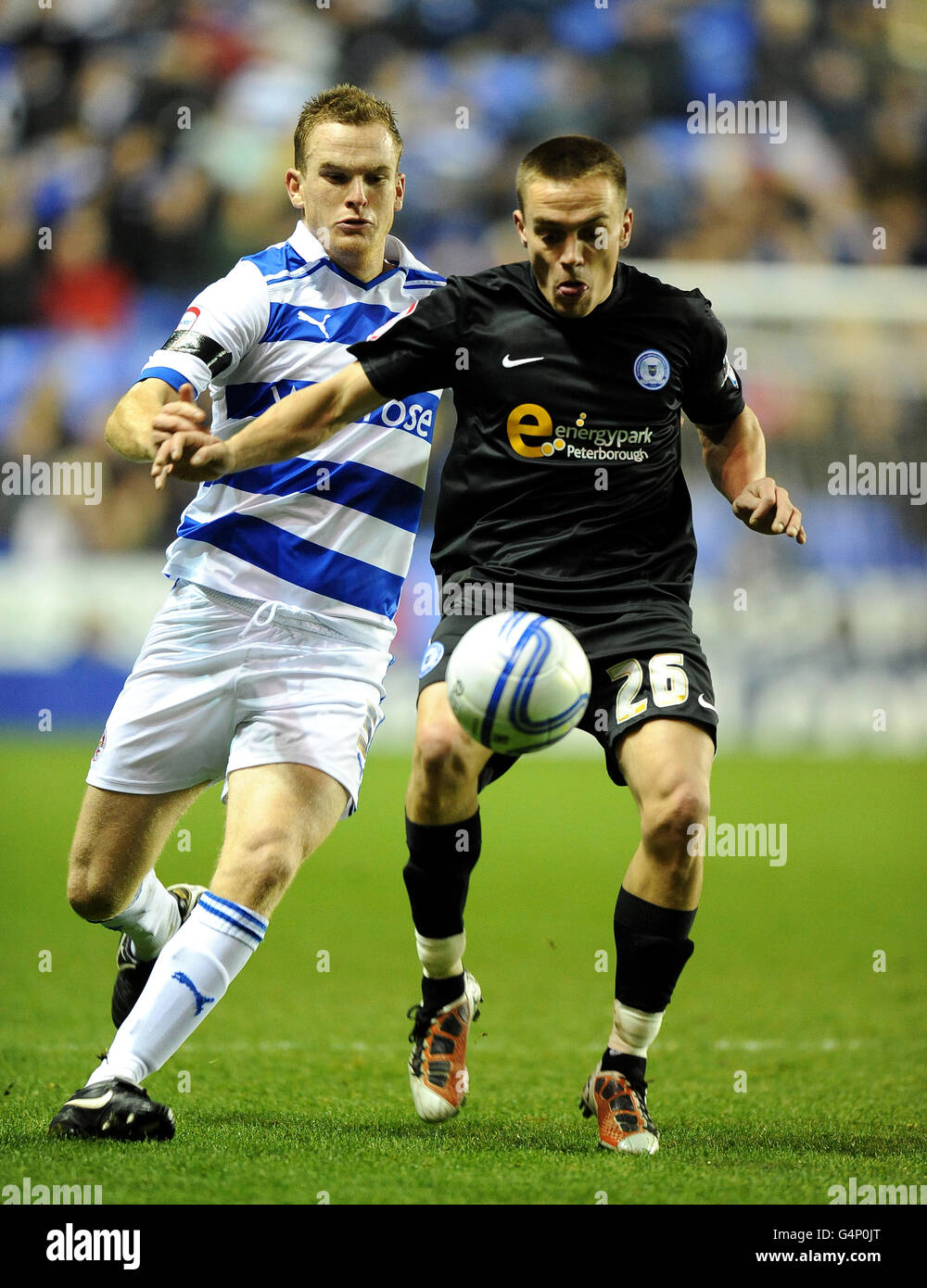 Reading's Alex Pearce (l) and Peterborough United's Paul Taylor Stock ...