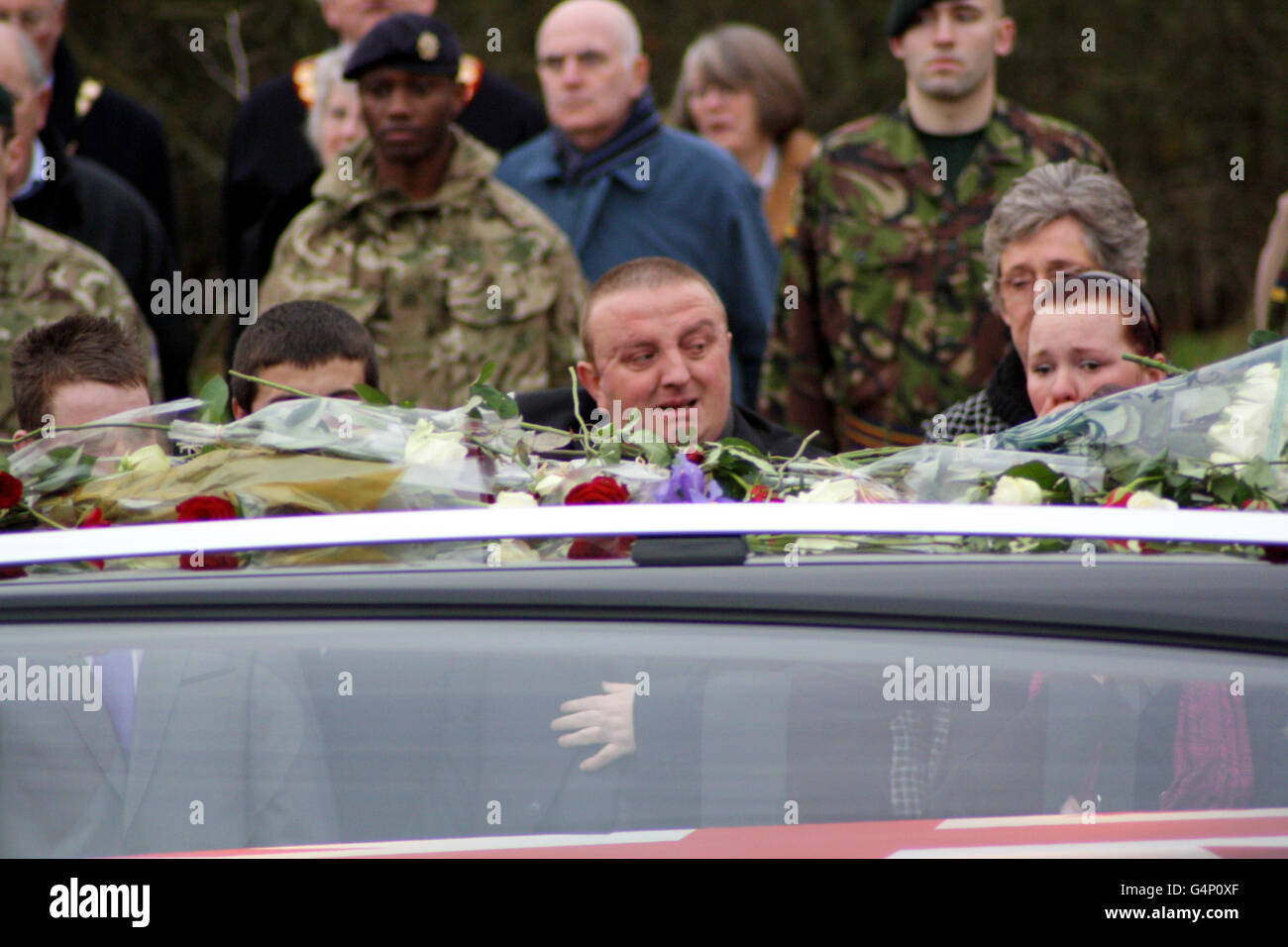 Family members fight back tears as the the body of Rifleman Sheldon ...