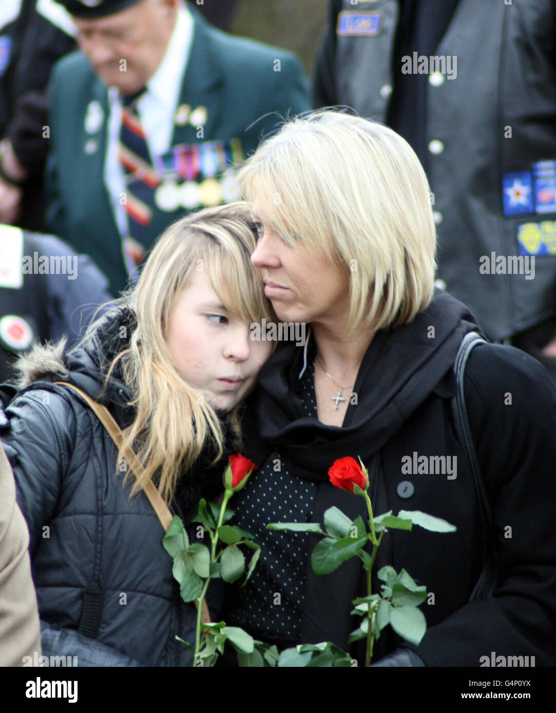 Family members comfort each other the body rifleman sheldon steel hi ...