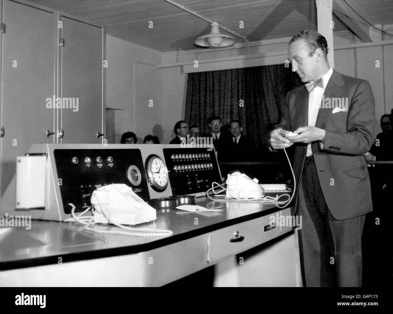 Ernest Marples, the Postmaster-General, pressing a button to start up ...