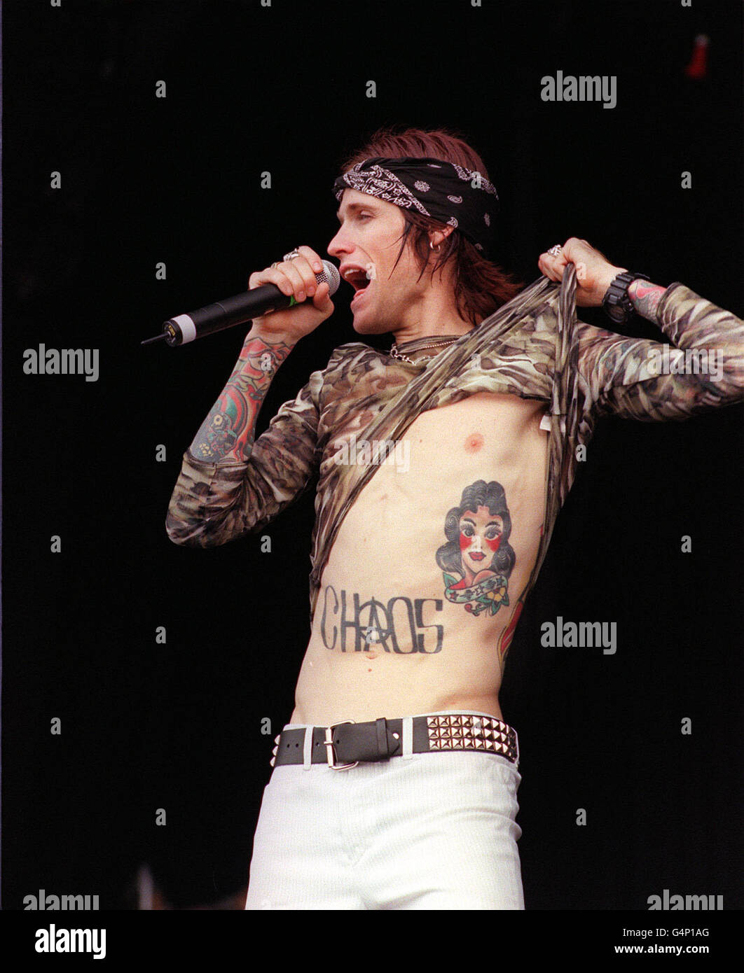 Lead singer band buckcherry performing on stage reading music festival ...