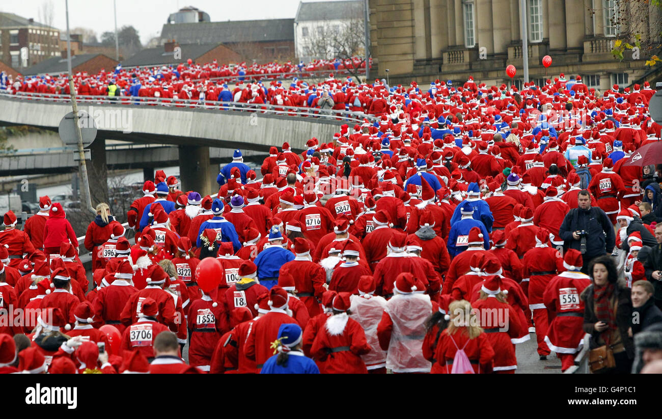 The Liverpool Santa Dash where over 8,000 runners are taking part in ...