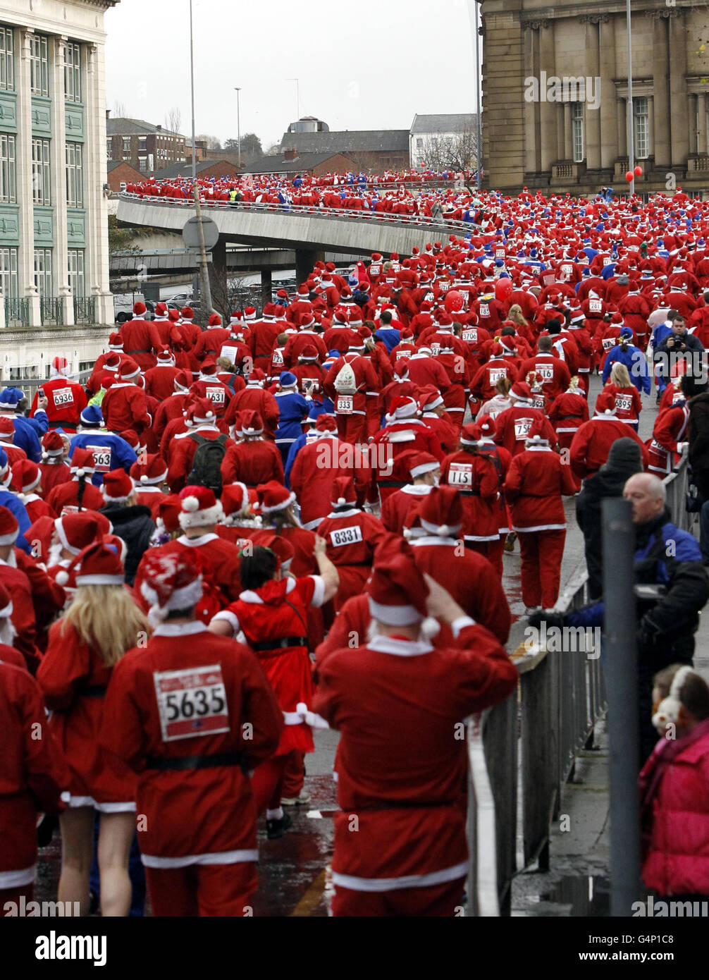 The Liverpool Santa Dash where over 8,000 runners are taking part in ...