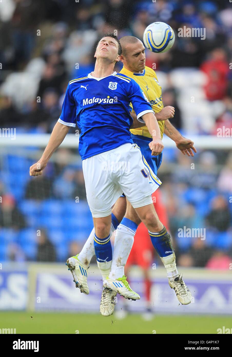 Cardiff City's Filip Kiss (left) and Birmingham City's David Murphy ...