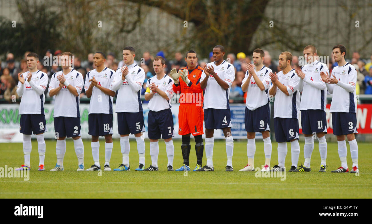 The AFC Totton team hold a minute's applause for Gary Speed before ...