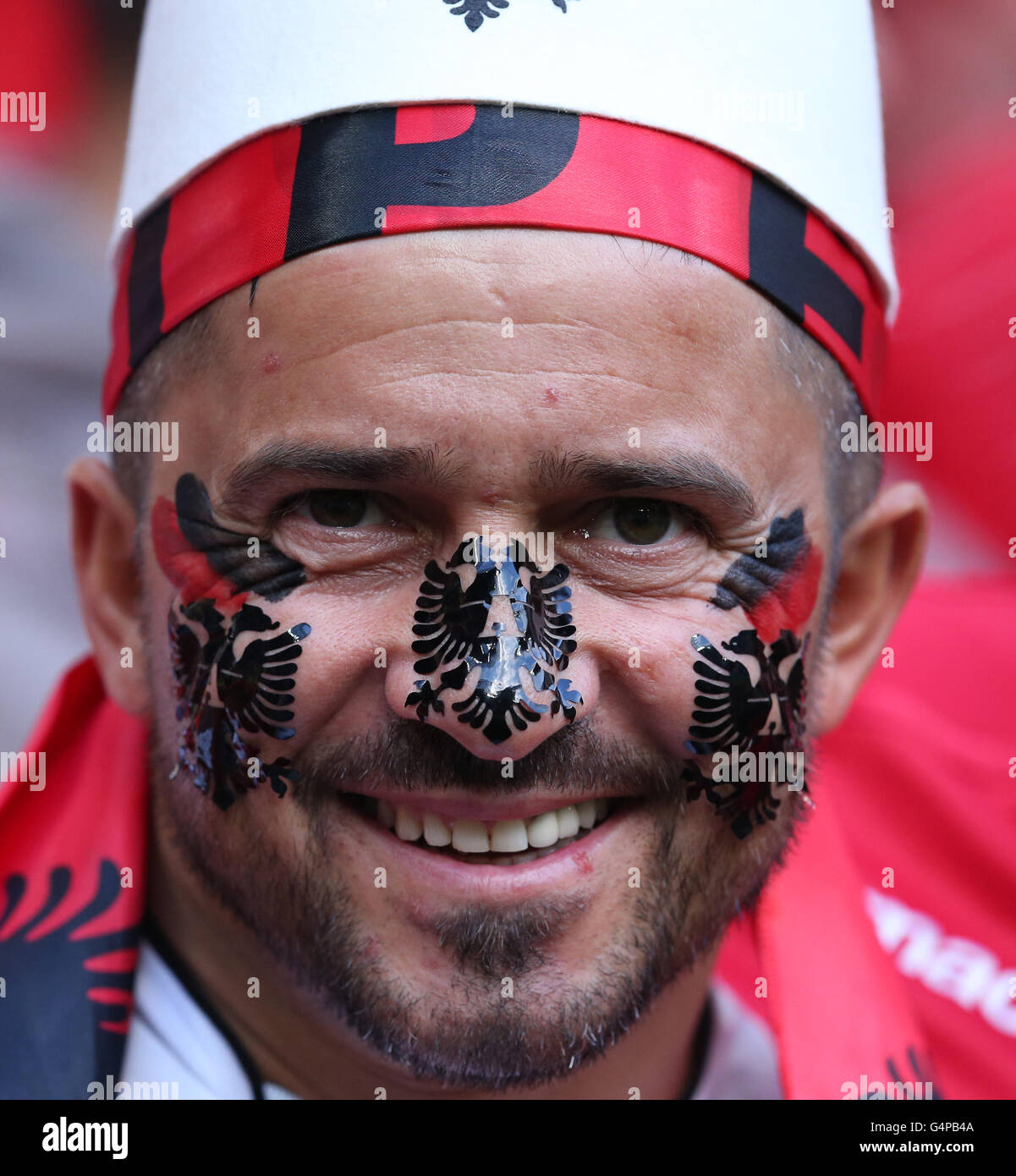 Lyon, France. 19th June, 2016. A fan of Albania cheers before the Euro ...