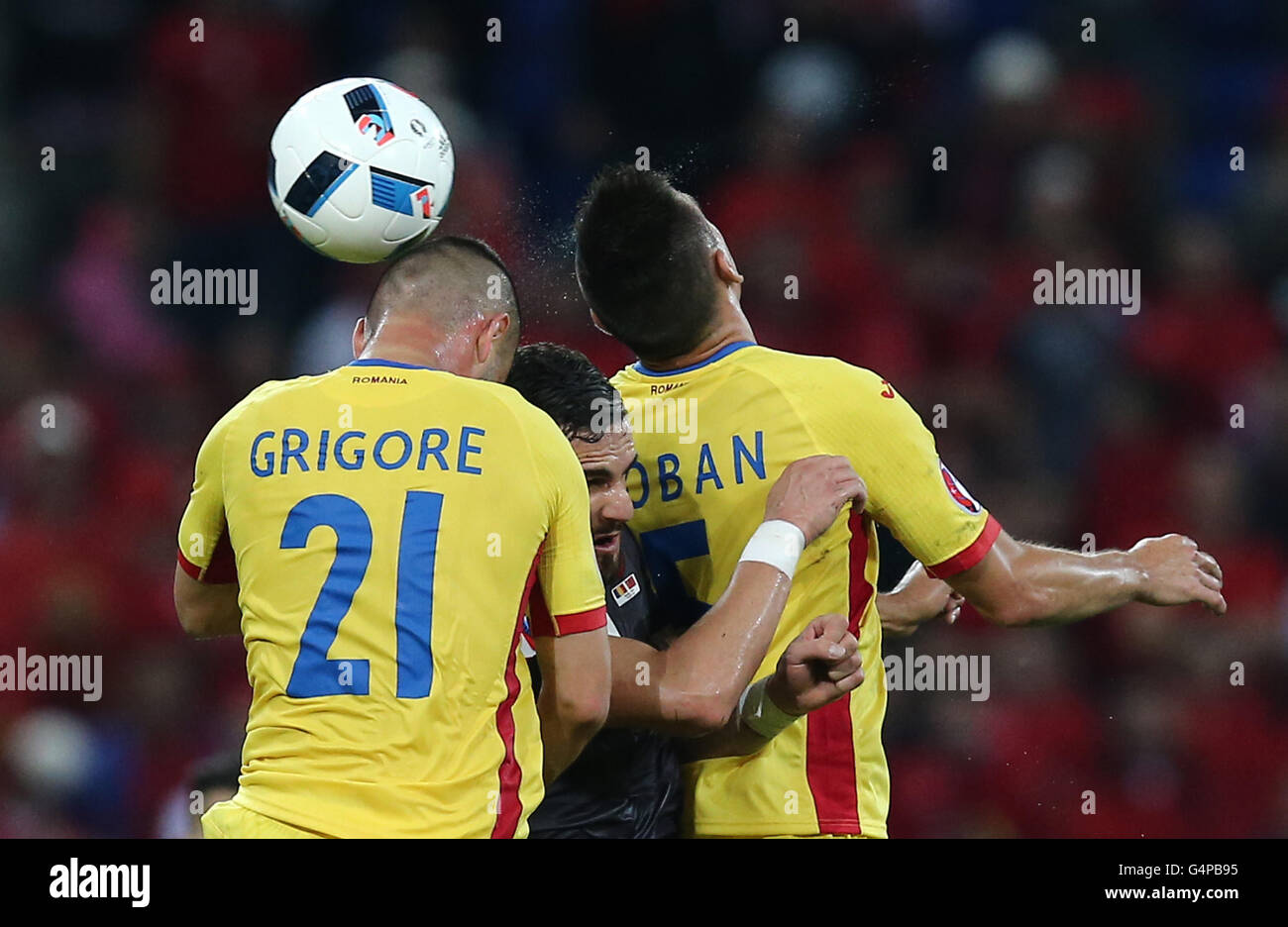Lyon, France. 19th June, 2016. Armando Sadiku (C) of Albania vies with ...