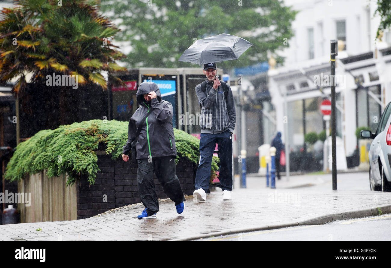 Eastbourne Sussex UK 20th June 2016 - People battle through torrential ...