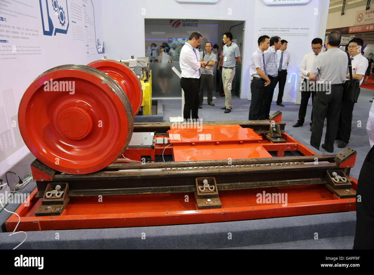 Beijing, China. 20th June, 2016. People view a device monitoring wheel ...