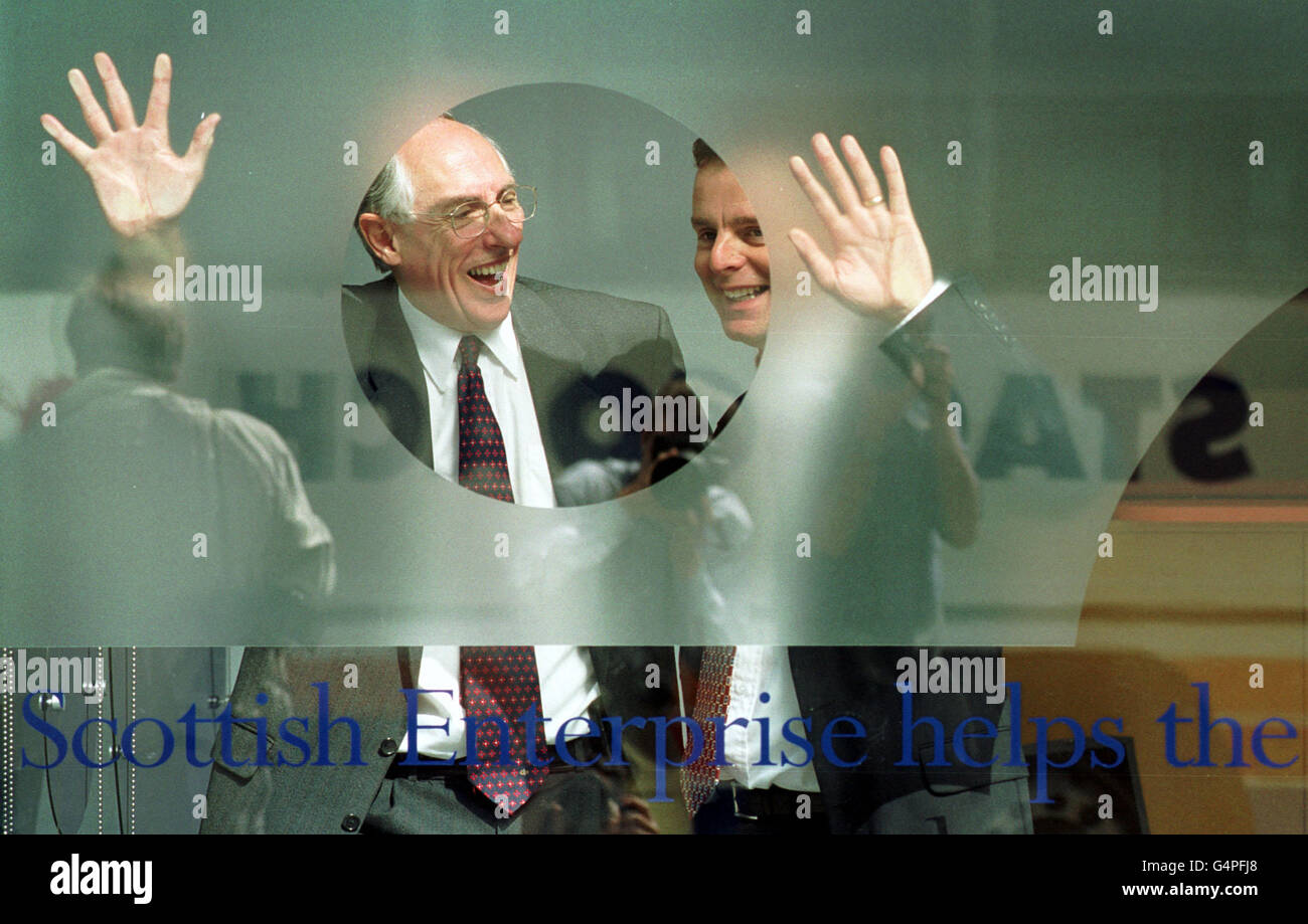 Scottish First Minister Donald Dewar (left) and Managing Director of ...