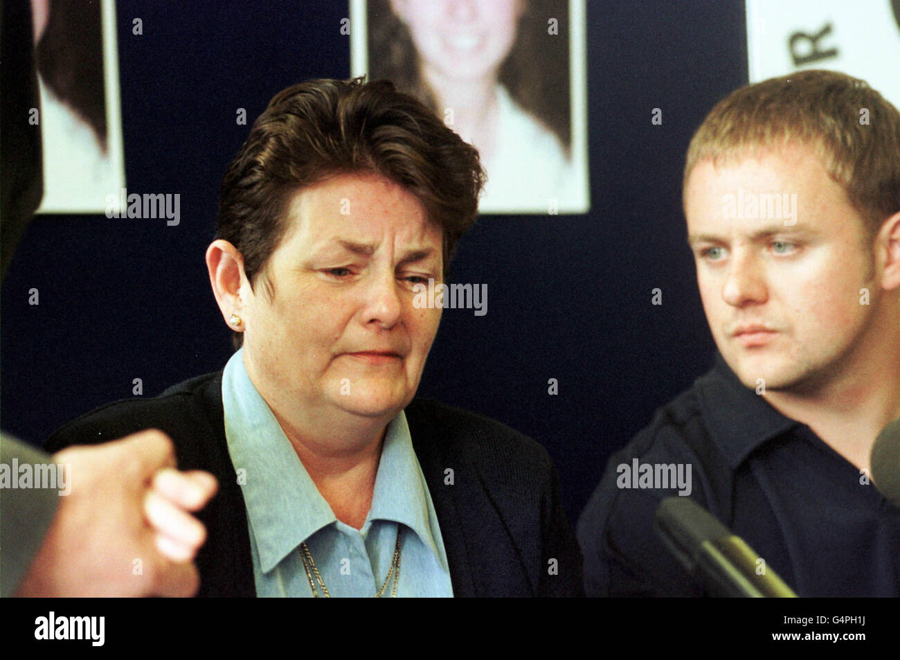 Anne Donnelly, mother of murdered Laura Anne Donnelly, clasps the hand ...
