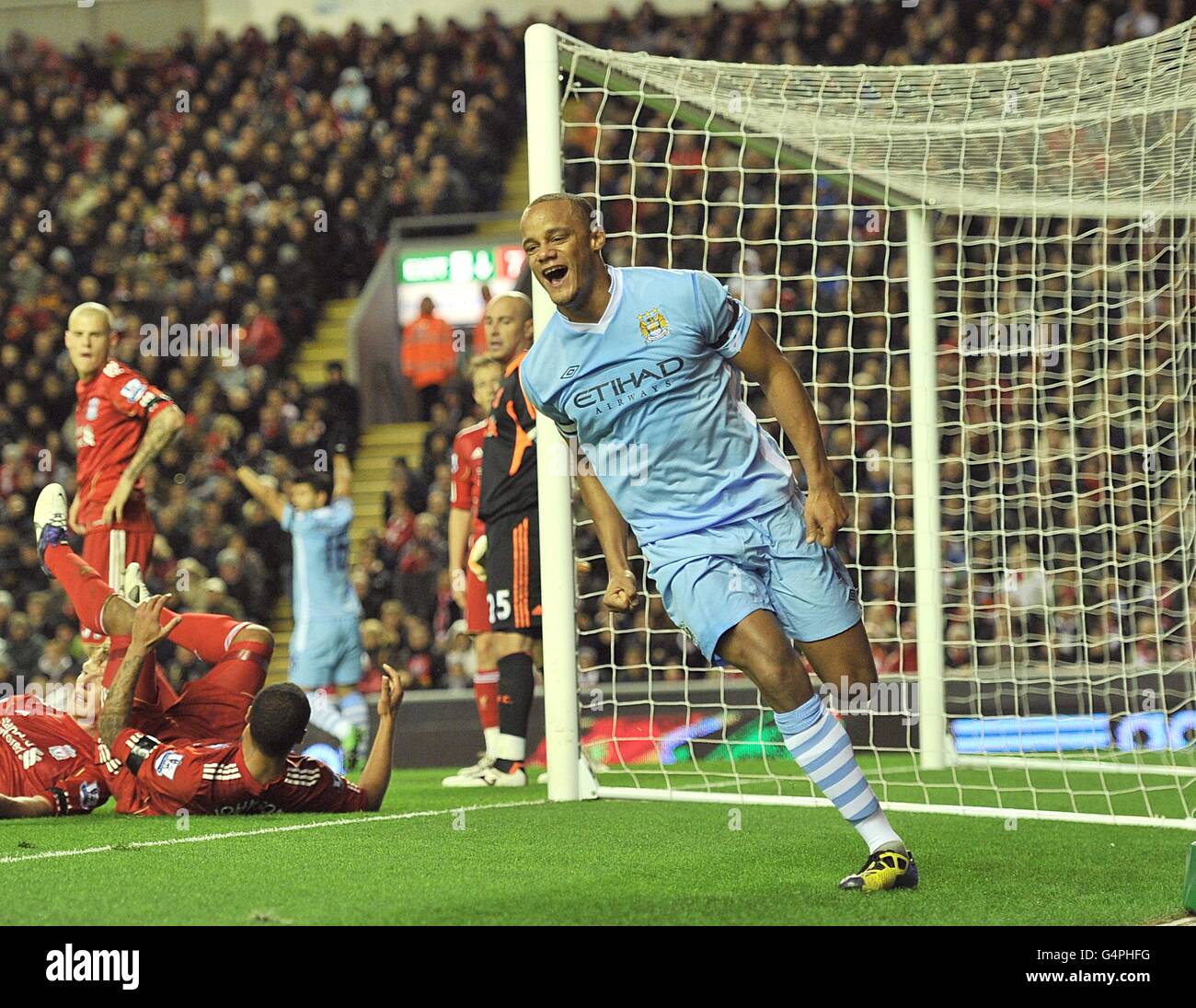 Manchester City's Vincent Kompany celebrates after scoring the first ...