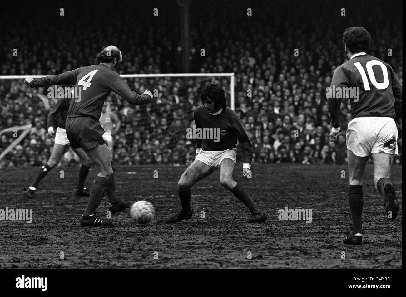 Northern Ireland's George Best (right) comes in to challenge Terry ...