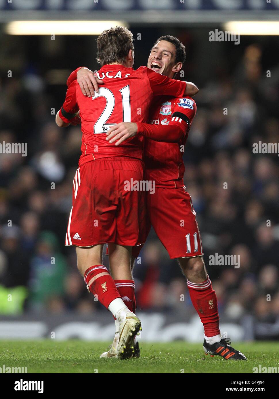 Liverpool's Maxi Rodriguez (right) celebrates with team mate Lucas ...