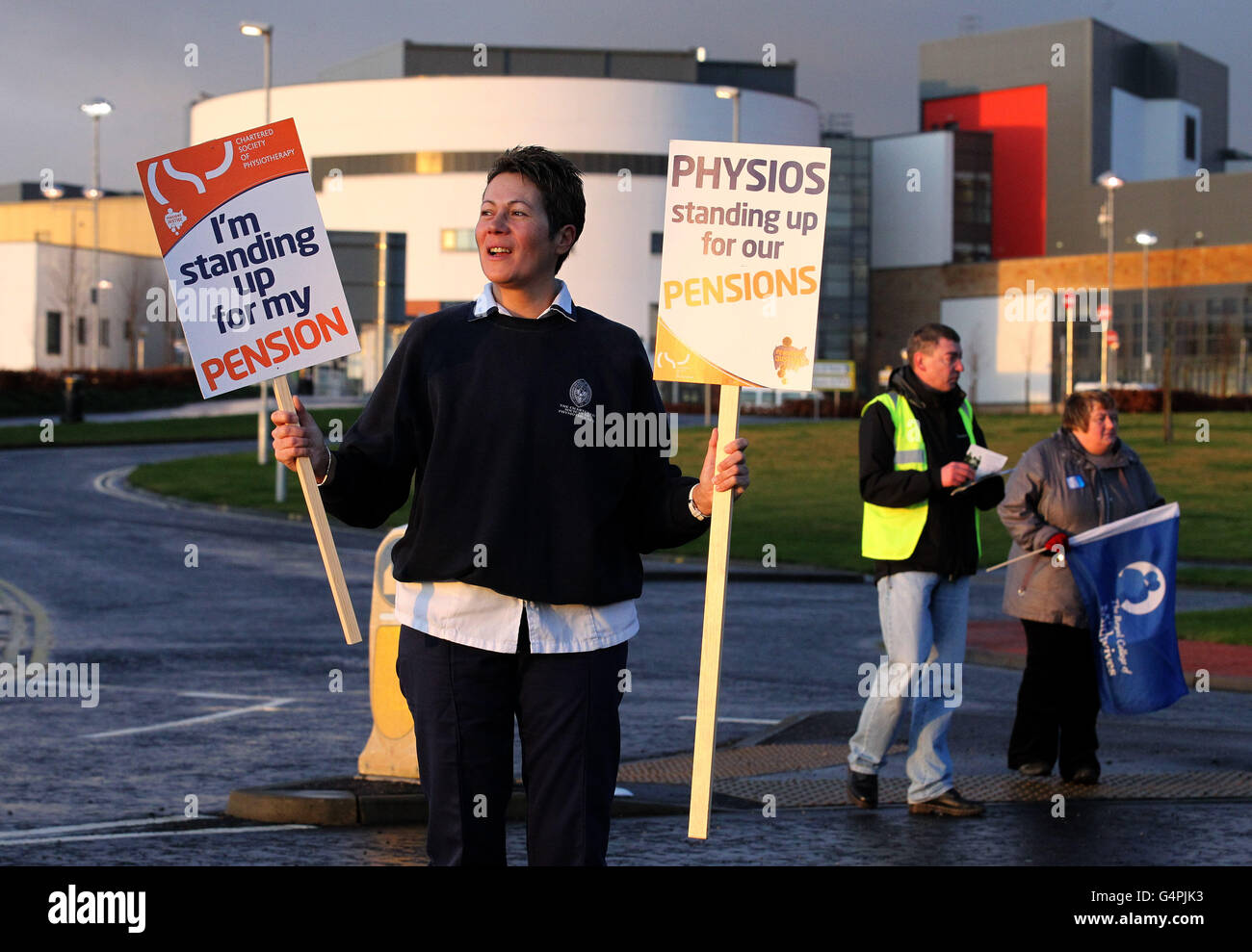 Public sector workers man a picket line at the entrance to the Forth ...