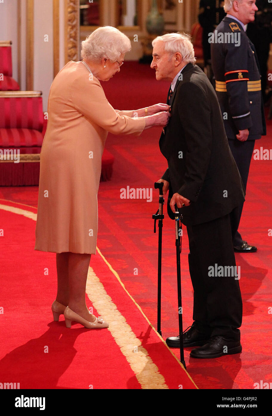 Investiture ceremony at Buckingham Palace Stock Photo - Alamy