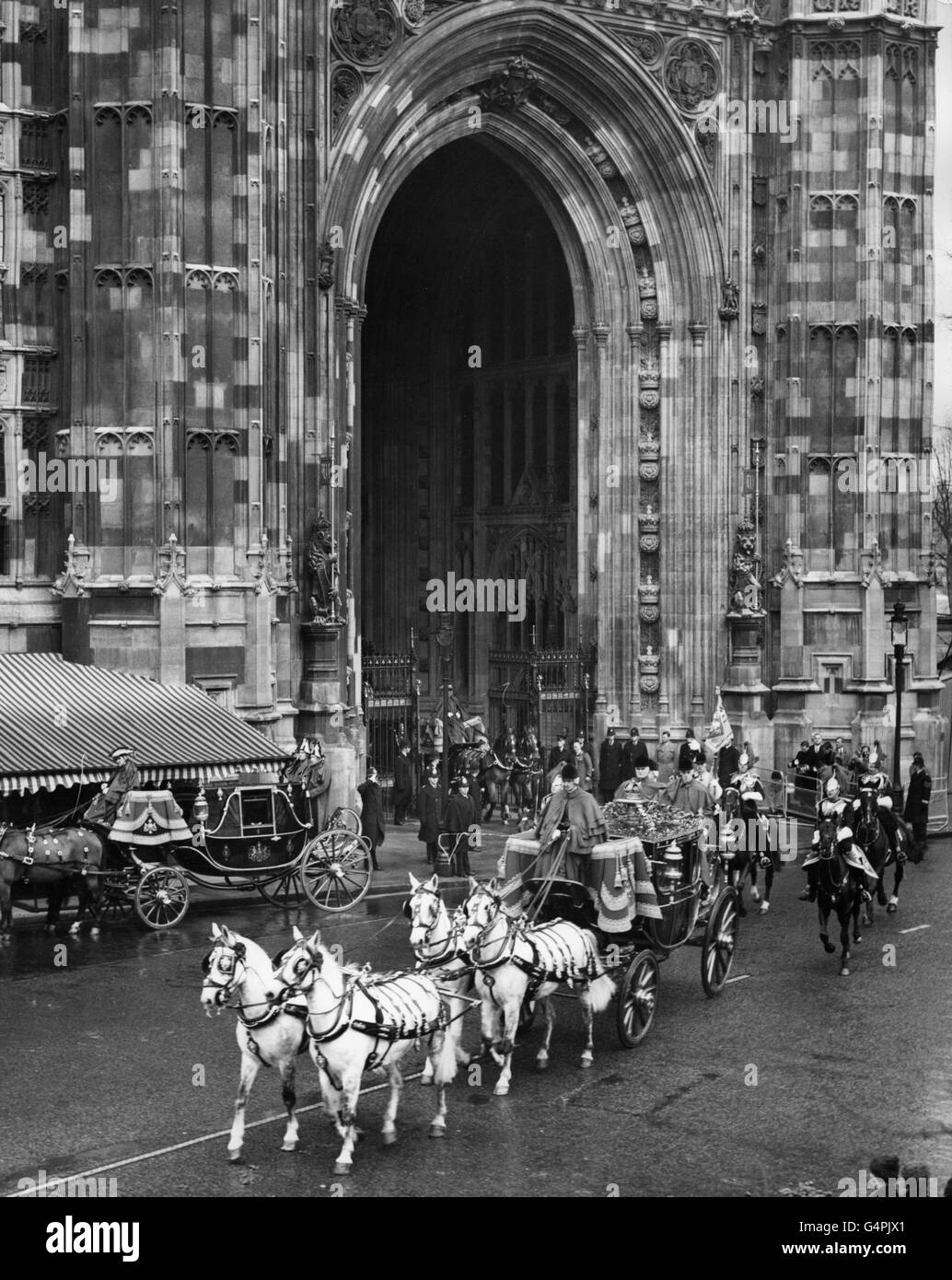 The Irish State Coach, bearing the Queen and Duke of Edinburgh, leaves ...