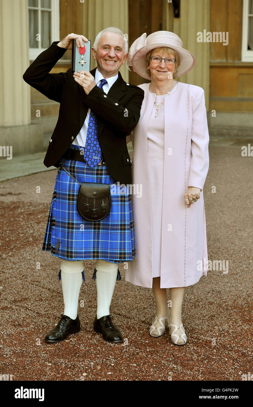 Investiture ceremony at Buckingham Palace Stock Photo - Alamy