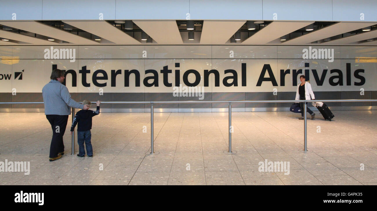 A empty terminal 5 at Heathrow Airport as plane arrivals and take-offs ...
