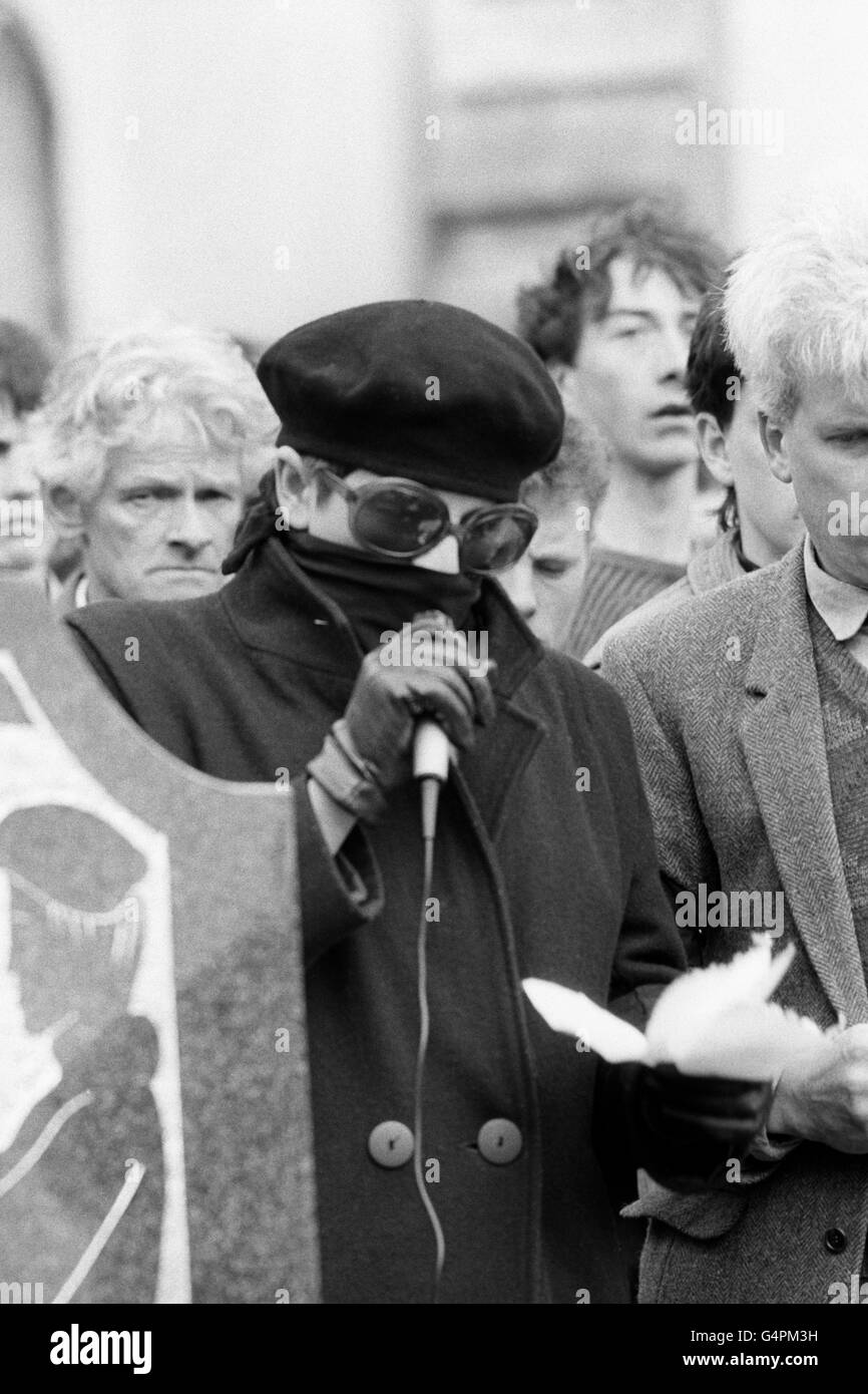 A heavily disguised IRA commander makes a speech at the funeral of ...
