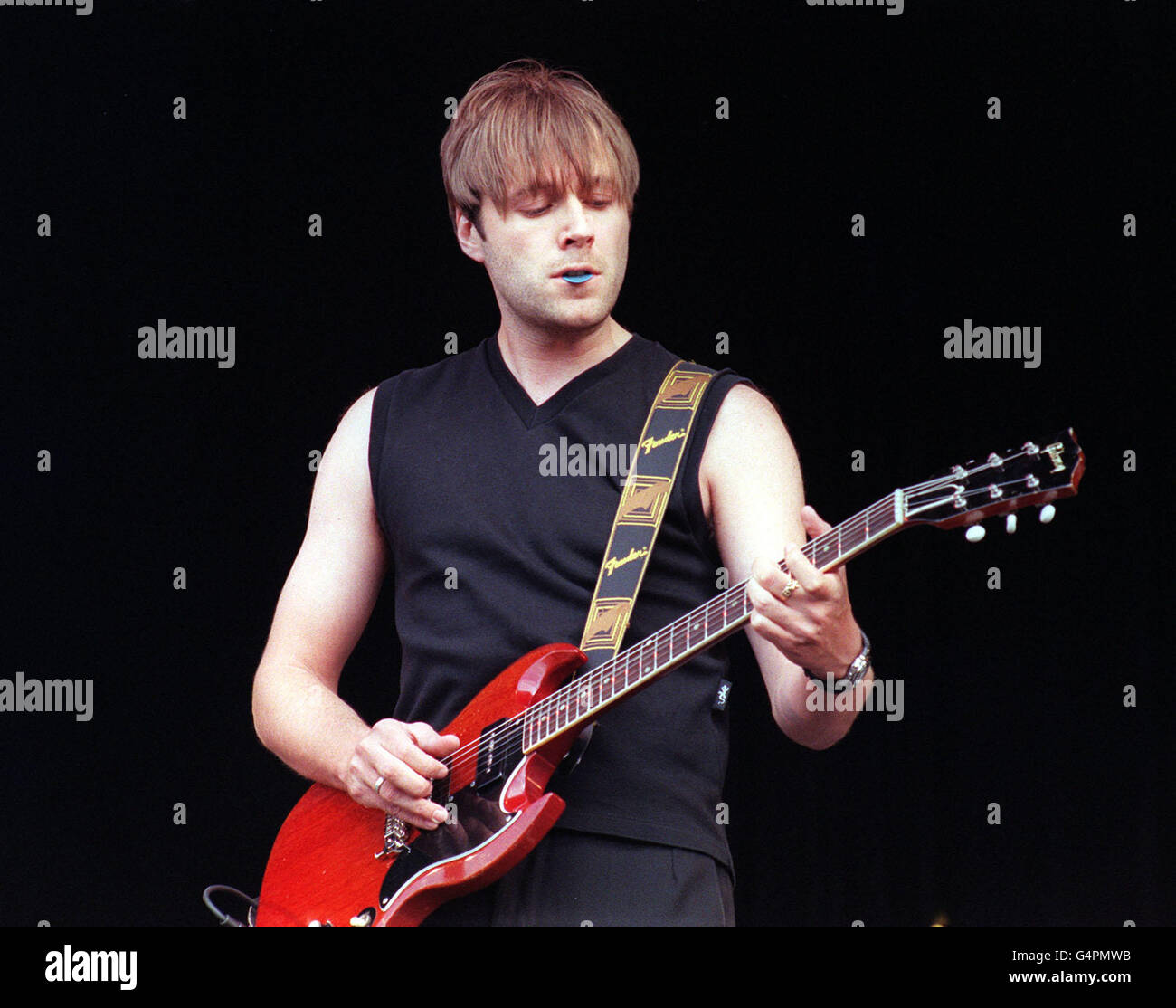 Steve Mason, guitarist with the pop band Gene, performing on stage at ...