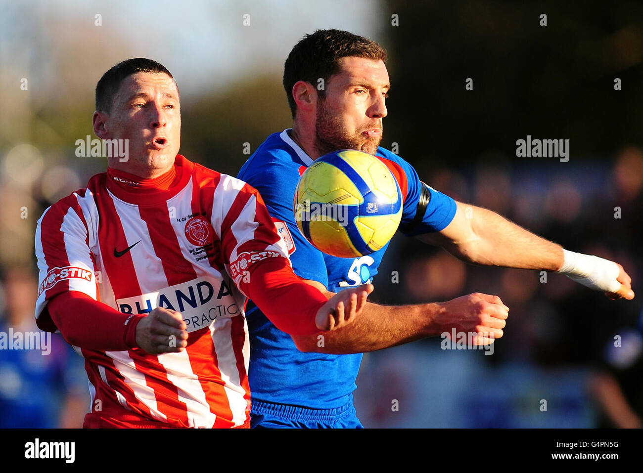 Stourbridge's Ryan Rowe (left) and Stevenage's Jon Ashton battle for ...
