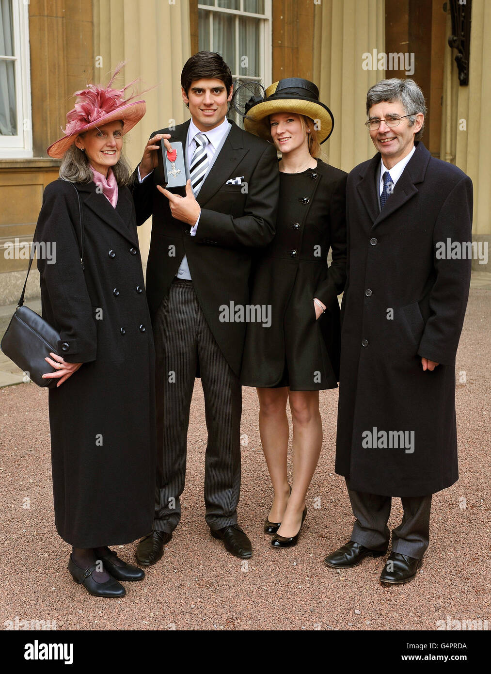 England cricketer Alastair Cook stands with his fiancée Alice Hunt and ...