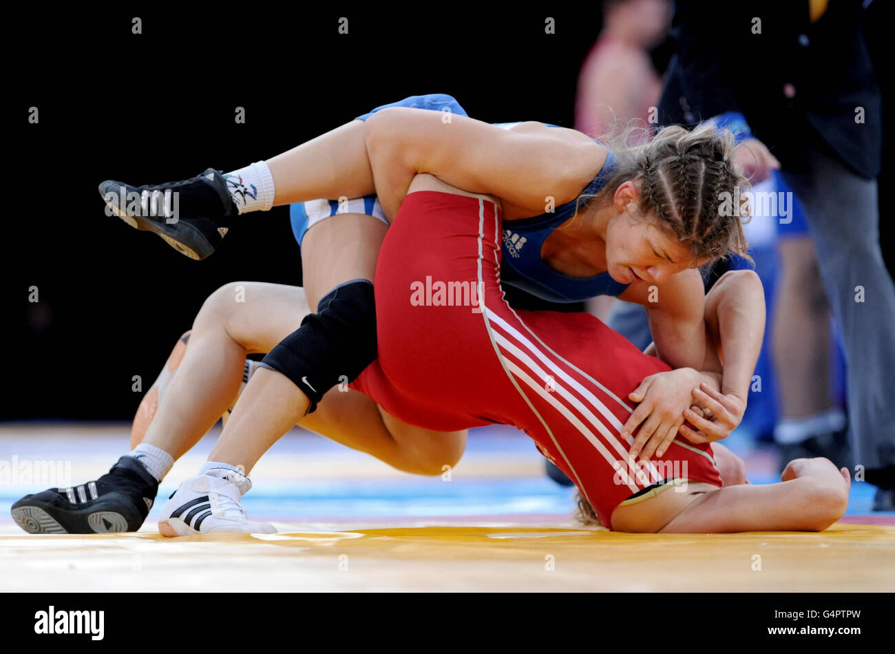 Great Britain's Olga Butkevych (top) competes against Azerbaijan's ...