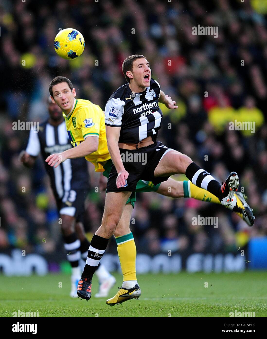 Norwich City's Andrew Crofts (left) and Newcastle United's Dan Gosling ...