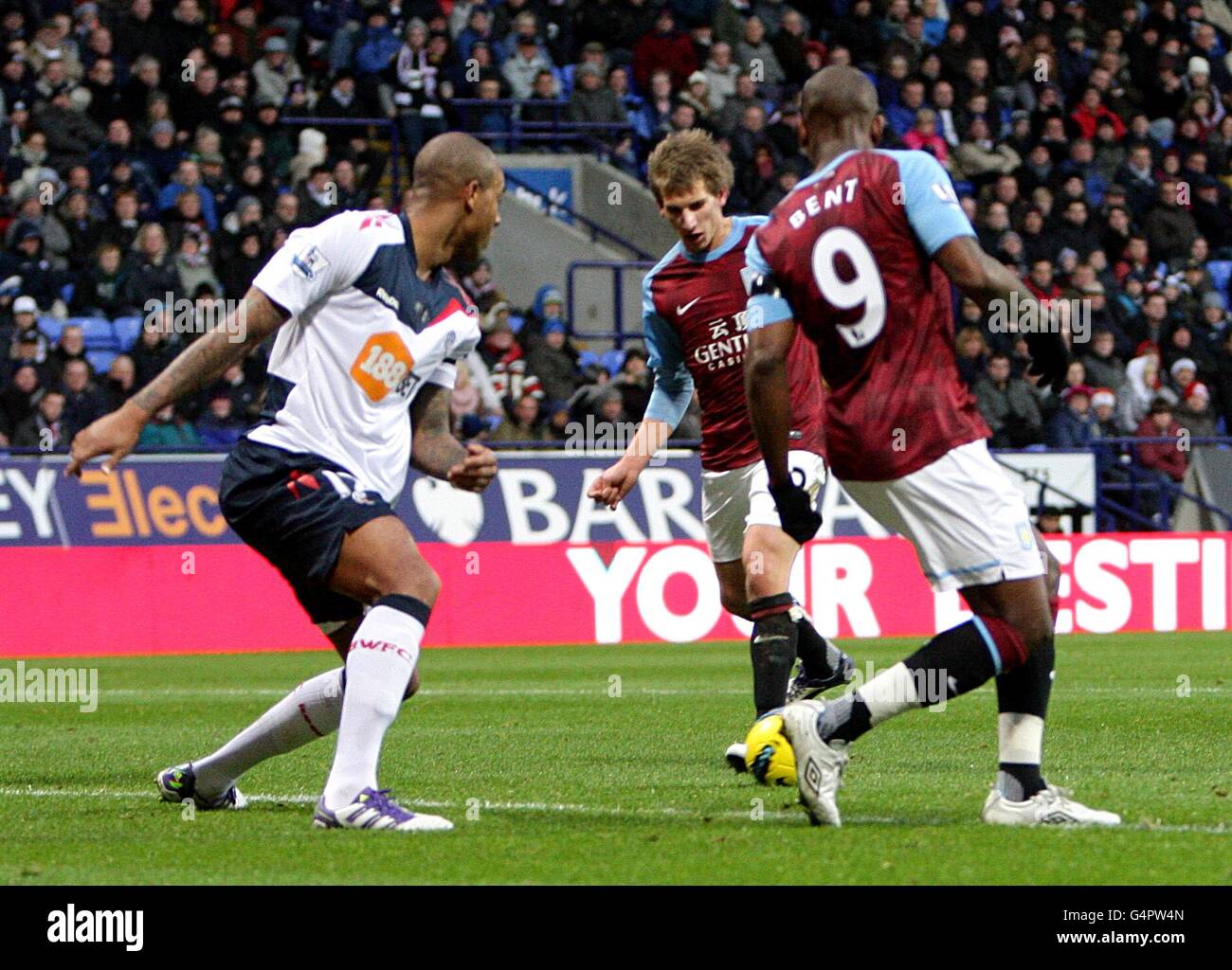 Aston Villa's Marc Albrighton (centre) receives the ball moments before ...