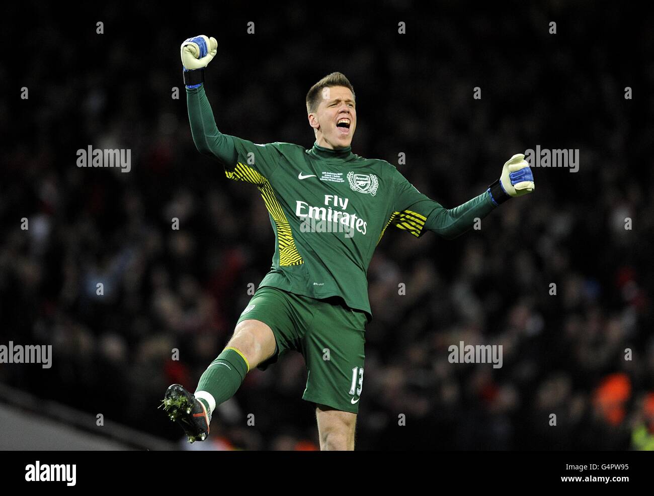 Arsenal goalkeeper Wojciech Szczesny celebrates after team mate Robin ...