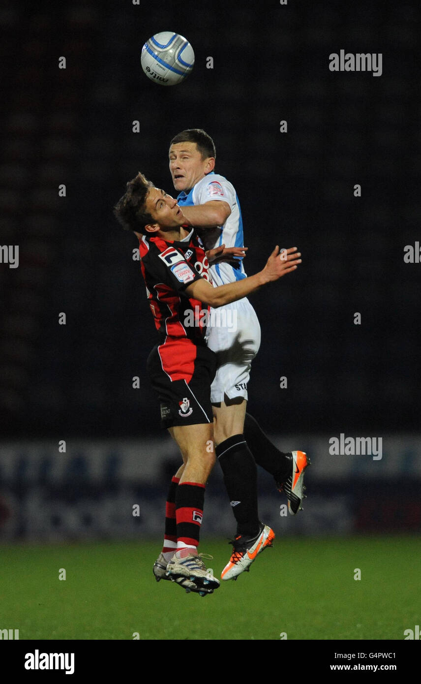 Bournemouth's Wes Fogden left and Huddersfield Town's Gary Naysmith ...