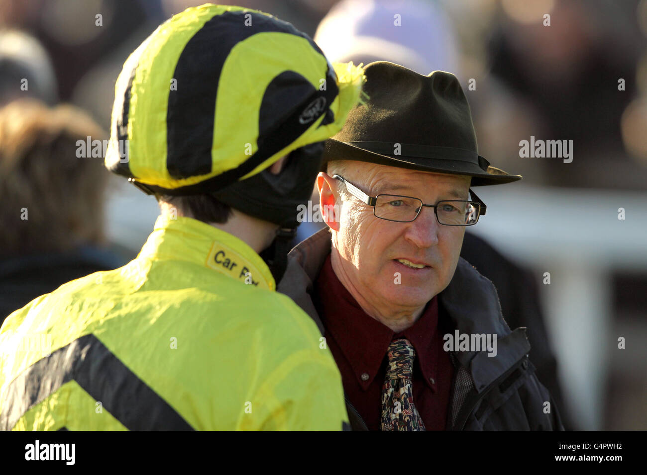 Jockey Joseph Cornwall speaks with his father and trainer John Cornwall ...