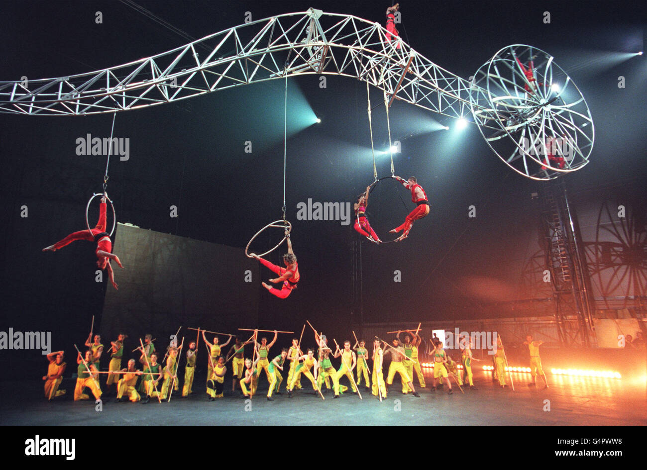 Acrobats and dancers go through their routines, during rehearsals for ...