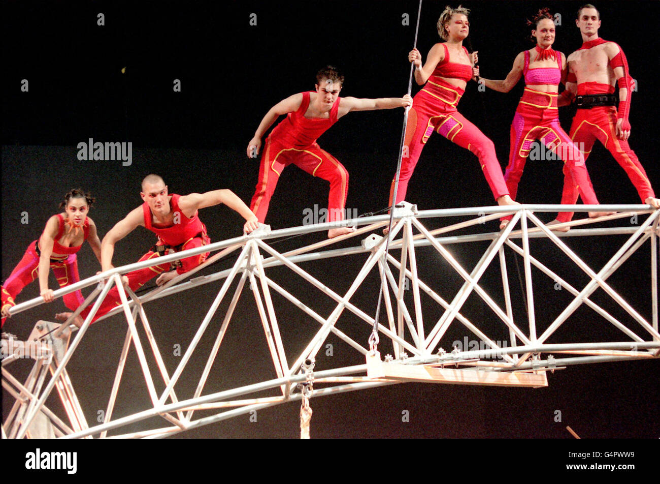 Acrobats and dancers go through their routines, during rehearsals for ...