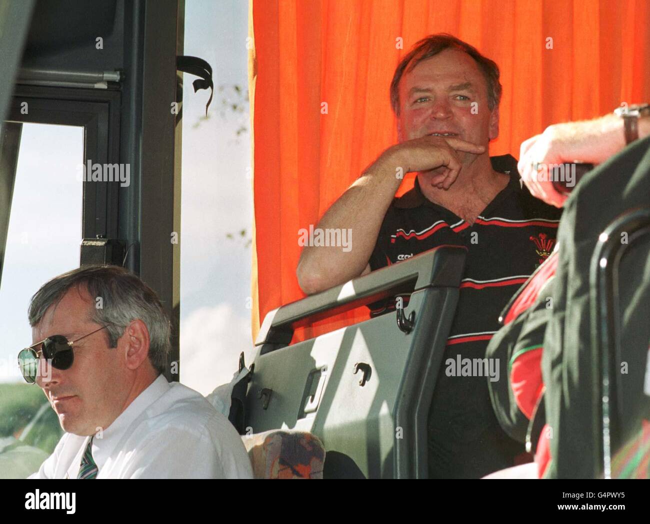 Wales Rugby coach Graham Henry (right) ready for departure from Cardiff ...